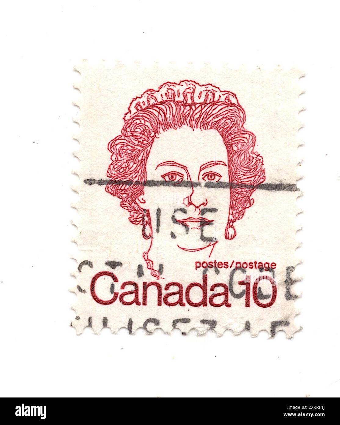 A vintage Queen Elizabeth II postage stamp from Canada on a white ...