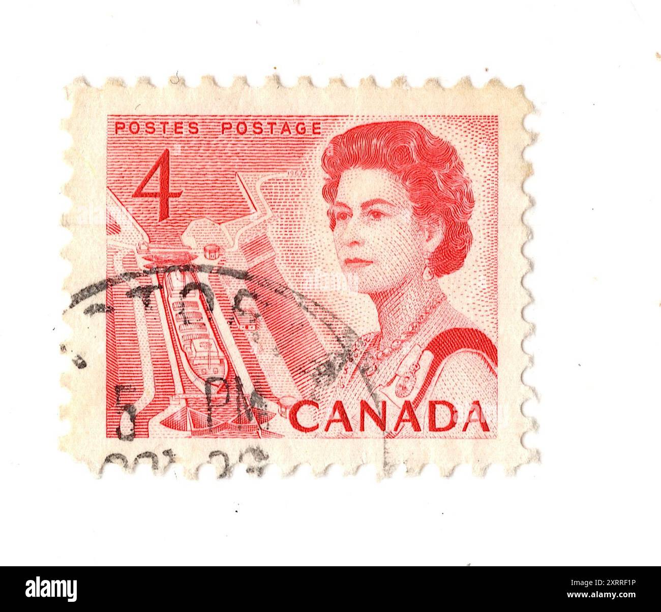 A vintage Queen Elizabeth II postage stamp from Canada on a white ...