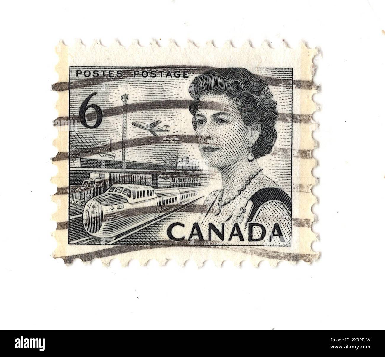 A vintage Queen Elizabeth II postage stamp from Canada on a white ...