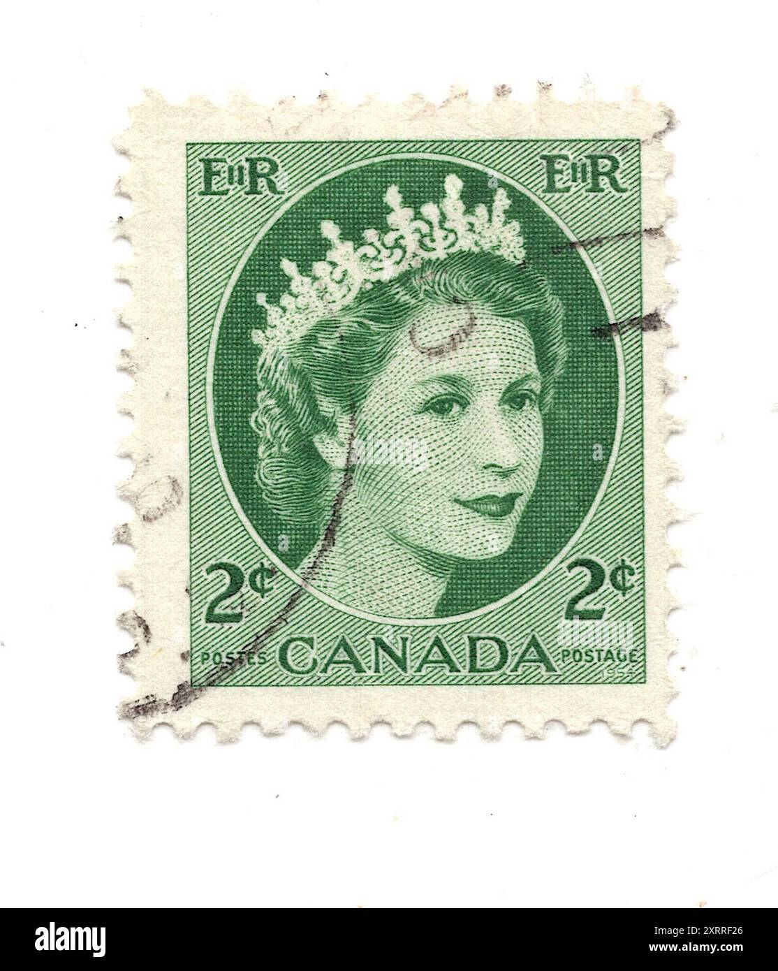 A vintage Queen Elizabeth II postage stamp from Canada on a white ...