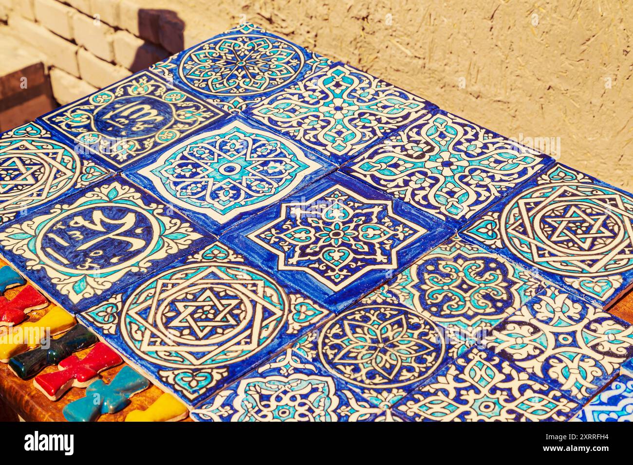 Ceramic tiles with traditional patterns at a street bazaar in Ichan ...