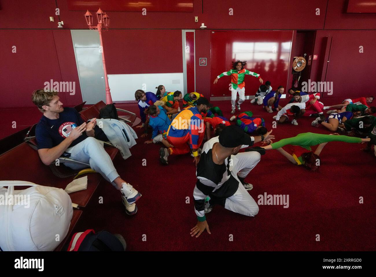 US athlete Max Holt, watches the performance of a Hip-Hop dance group ...