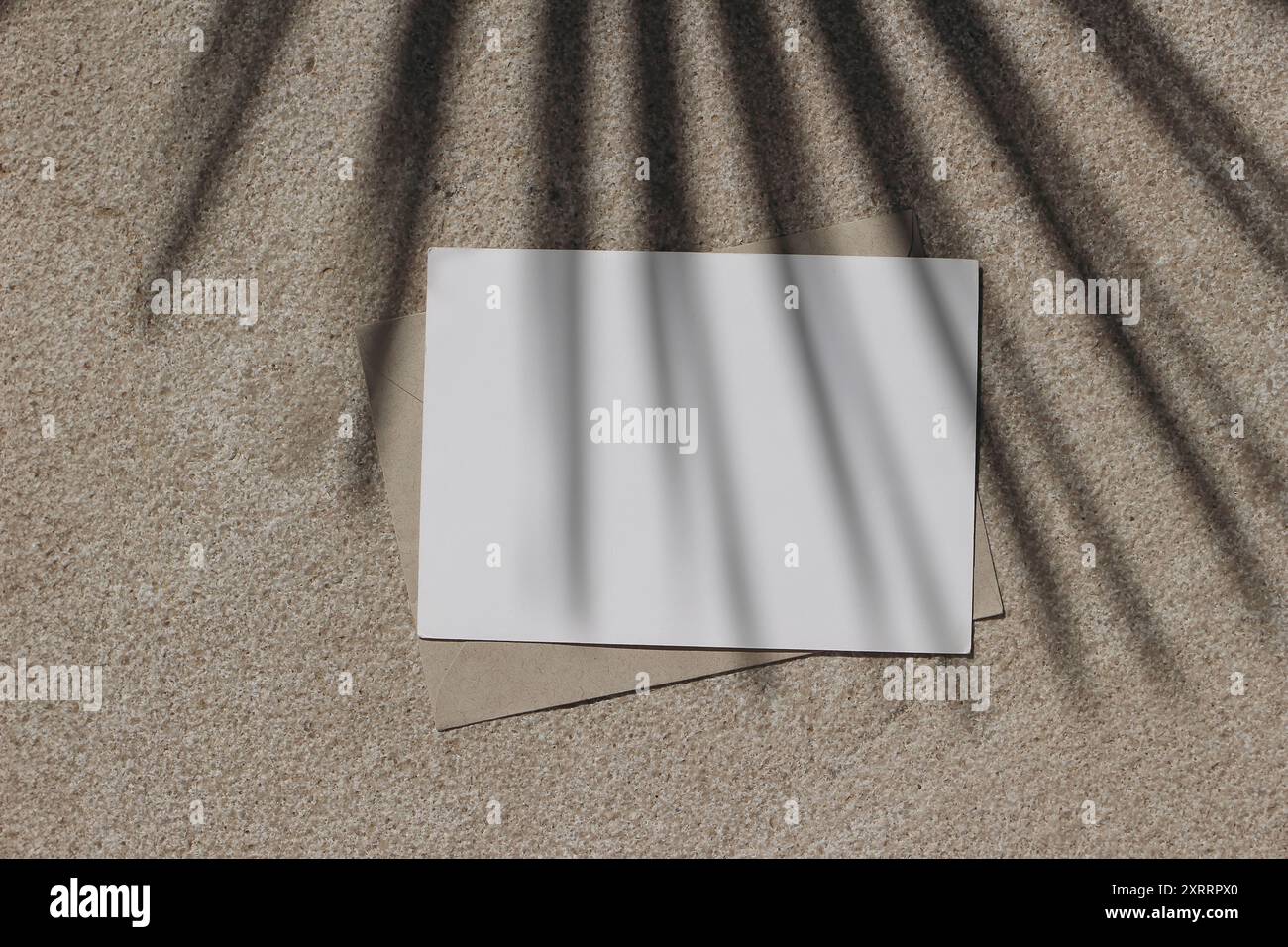 Empty horizontal greeting card invitation mockup, craft envelope. Beige ...