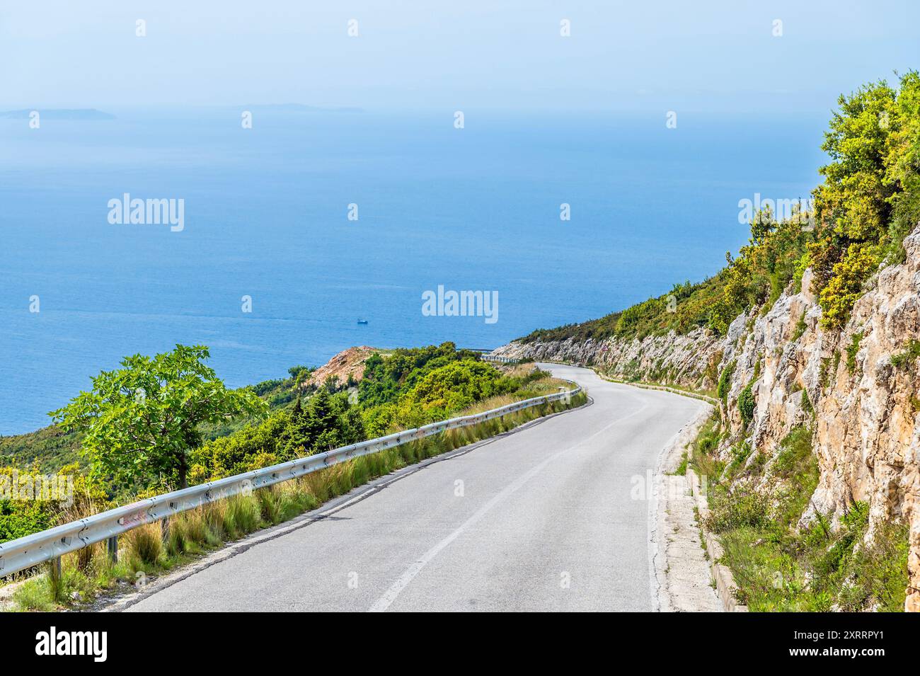 A view approaching a bend on the descent from the heights of the ...