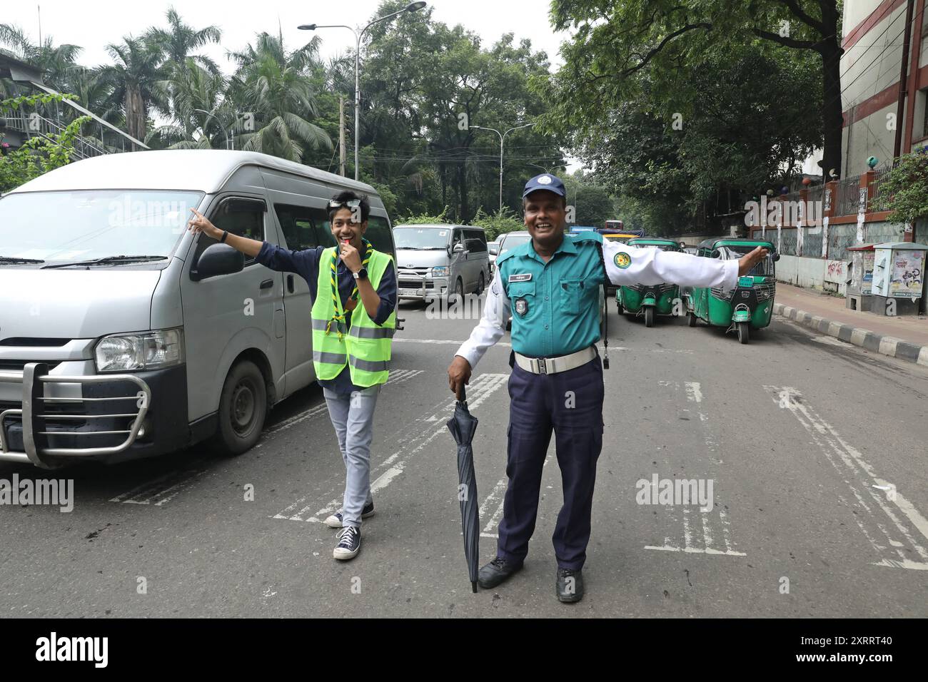 Dhaka, Bangladesh. 12th Aug, 2024. police personnel controls traffic at ...
