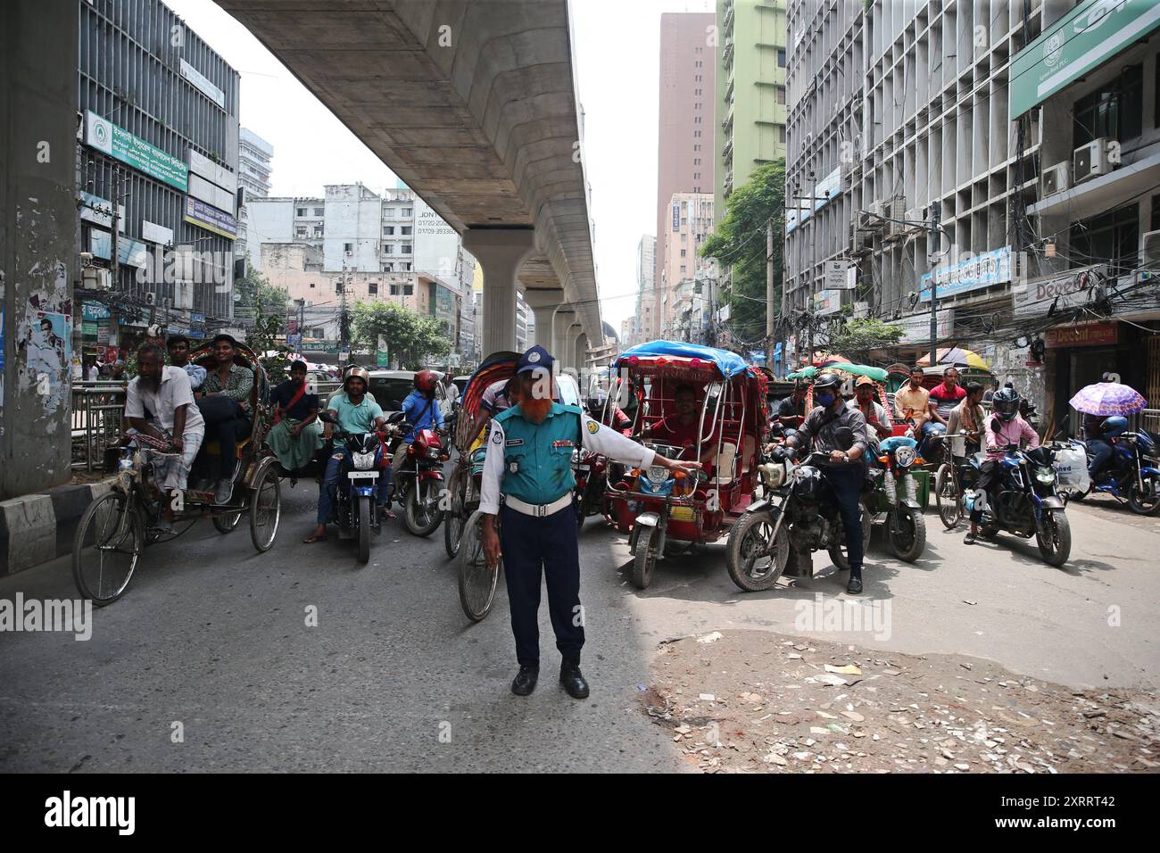 Dhaka, Bangladesh. 01st Jan, 2000. police personnel controls traffic at ...
