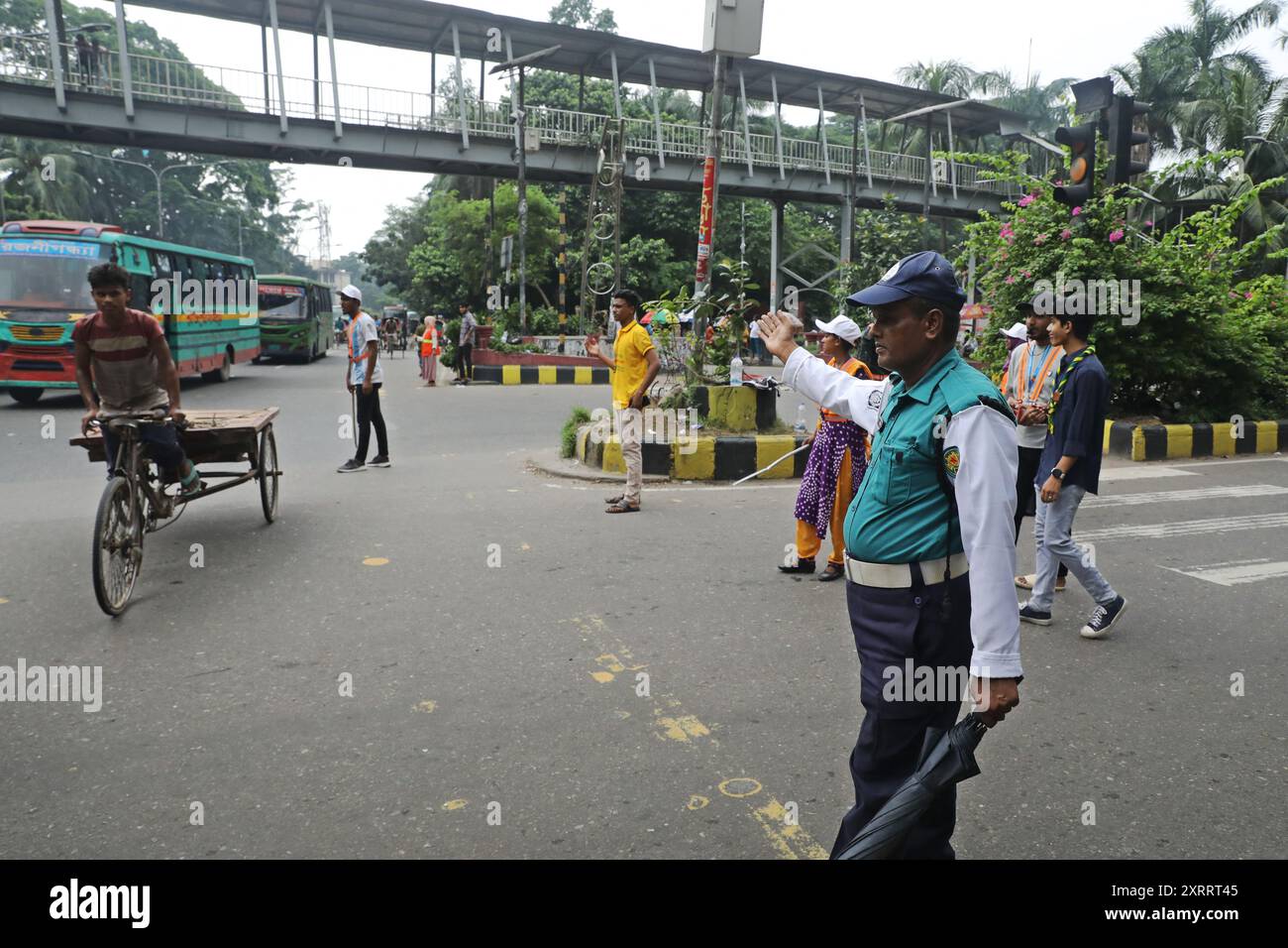 Dhaka, Bangladesh. 12th Aug, 2024. police personnel controls traffic at ...