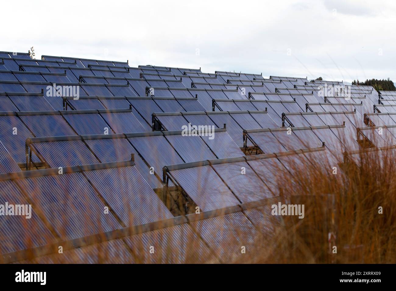 Solar panels field at electrical power generation station Stock Photo ...