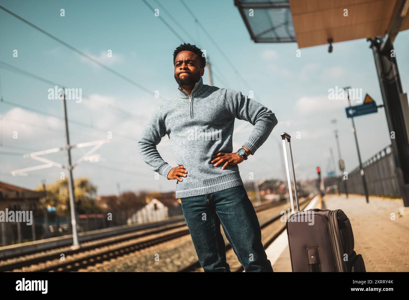 Angry man standing train hi-res stock photography and images - Alamy