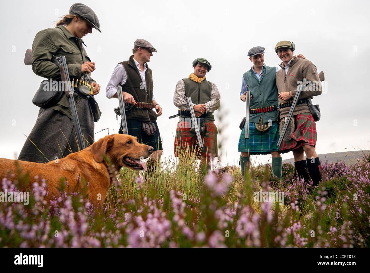 Members of a shooting party on the moors in the Lammermuir Hills, near ...
