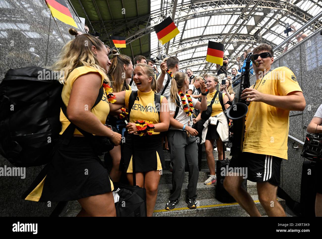 Cologne, Germany. 12th Aug, 2024. André Schnura (r), saxophonist, plays ...