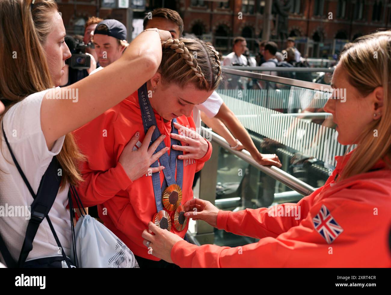 Great Britain's Emma Finucane with her gold and two bronze medals as ...
