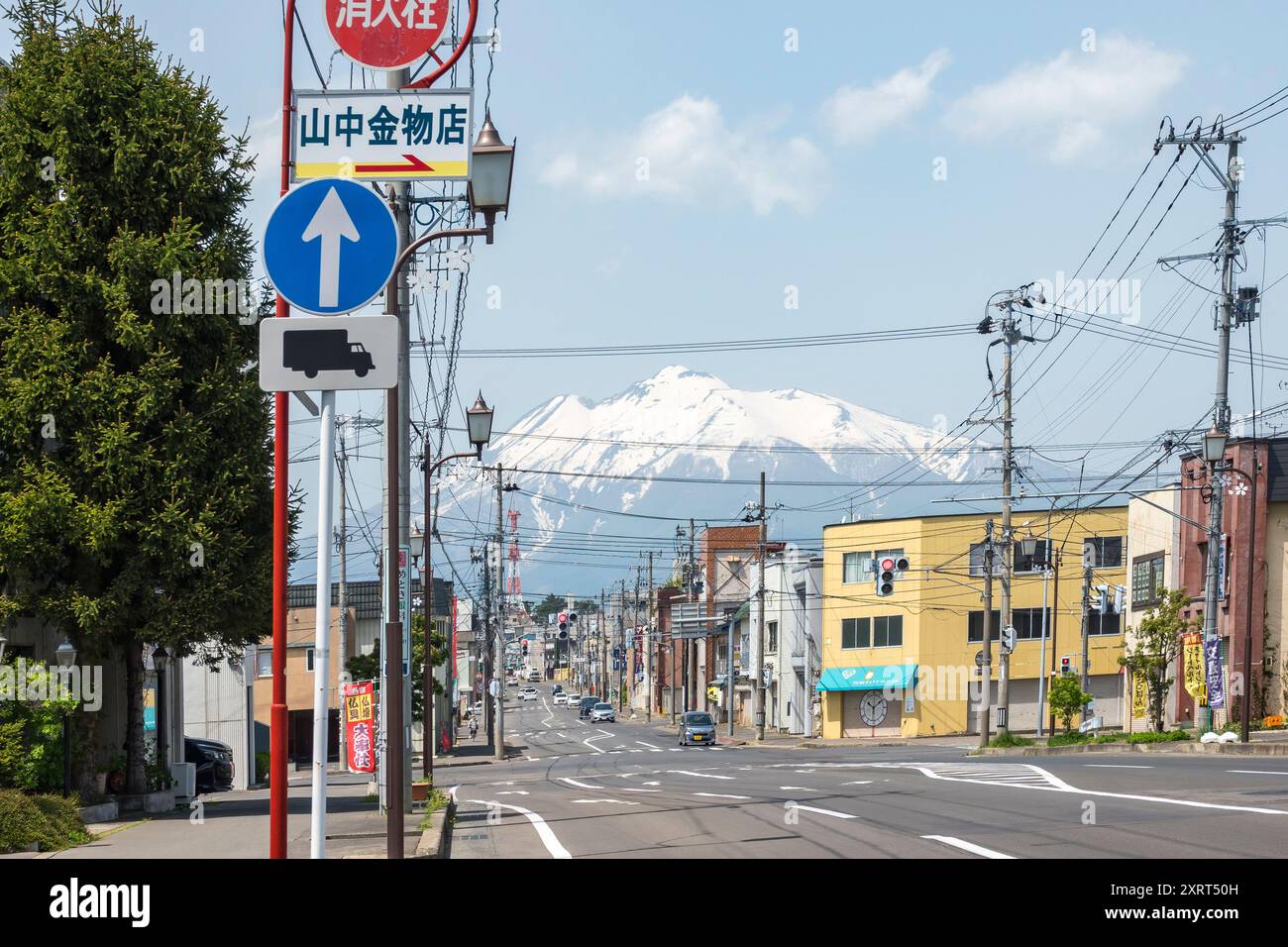 Road leading to Hirosaki Castle and Park, with Mount Iwaki in the ...