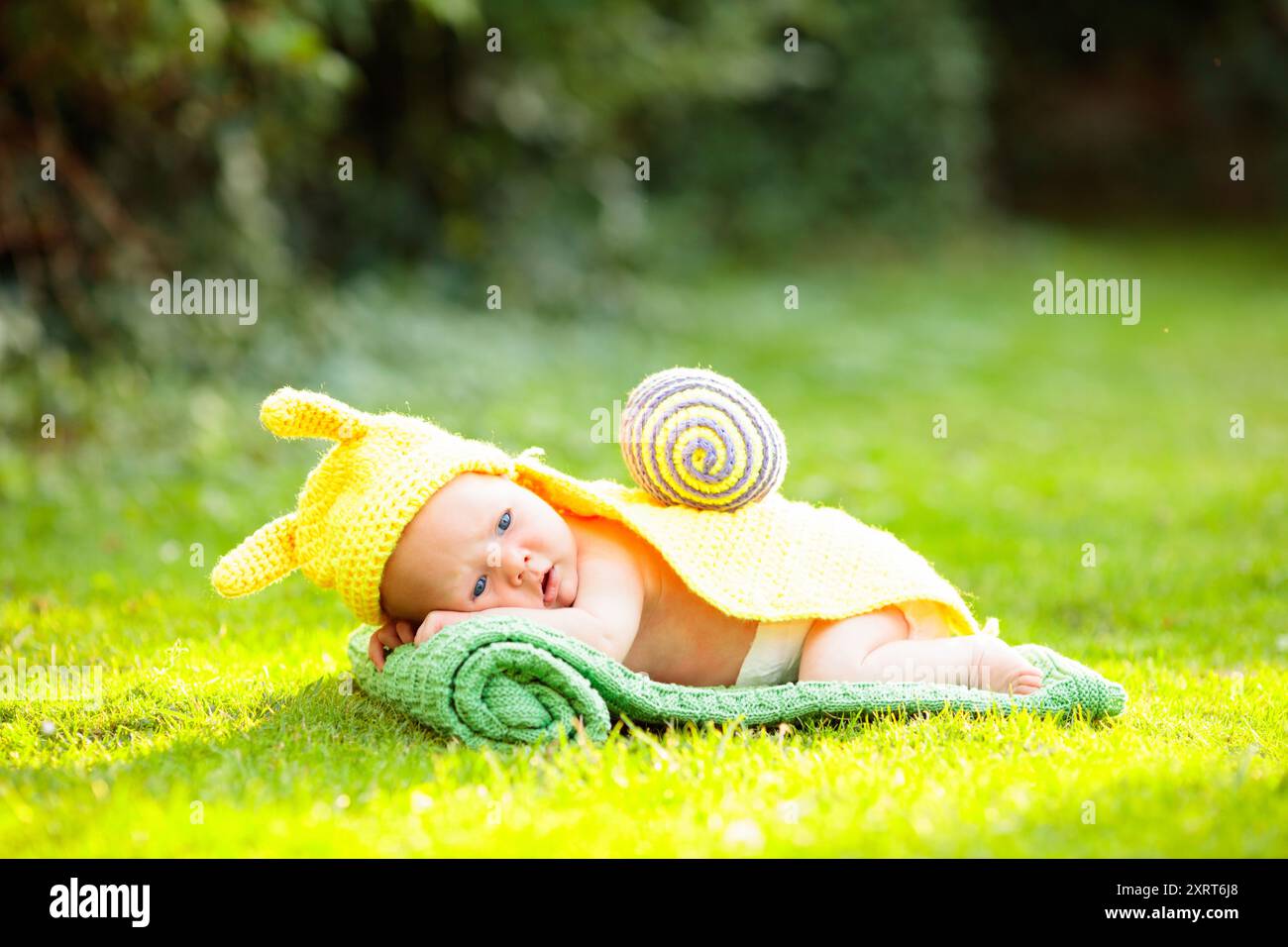 Baby in cute dress up costume. Newborn in garden. Adorable infant ...