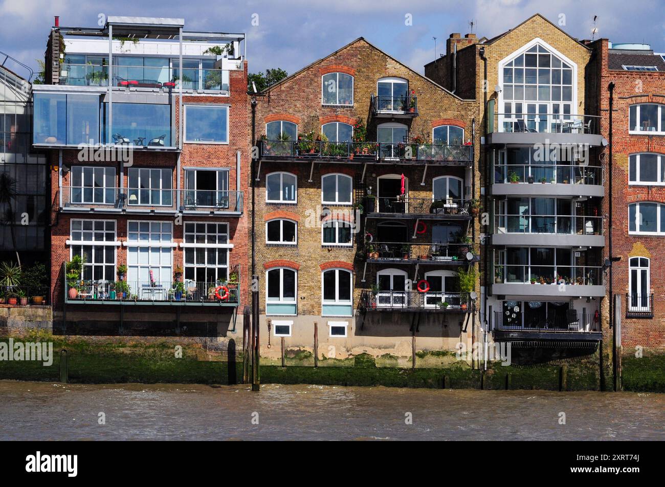 Riverside terrace blending modern and traditional in historic urban ...