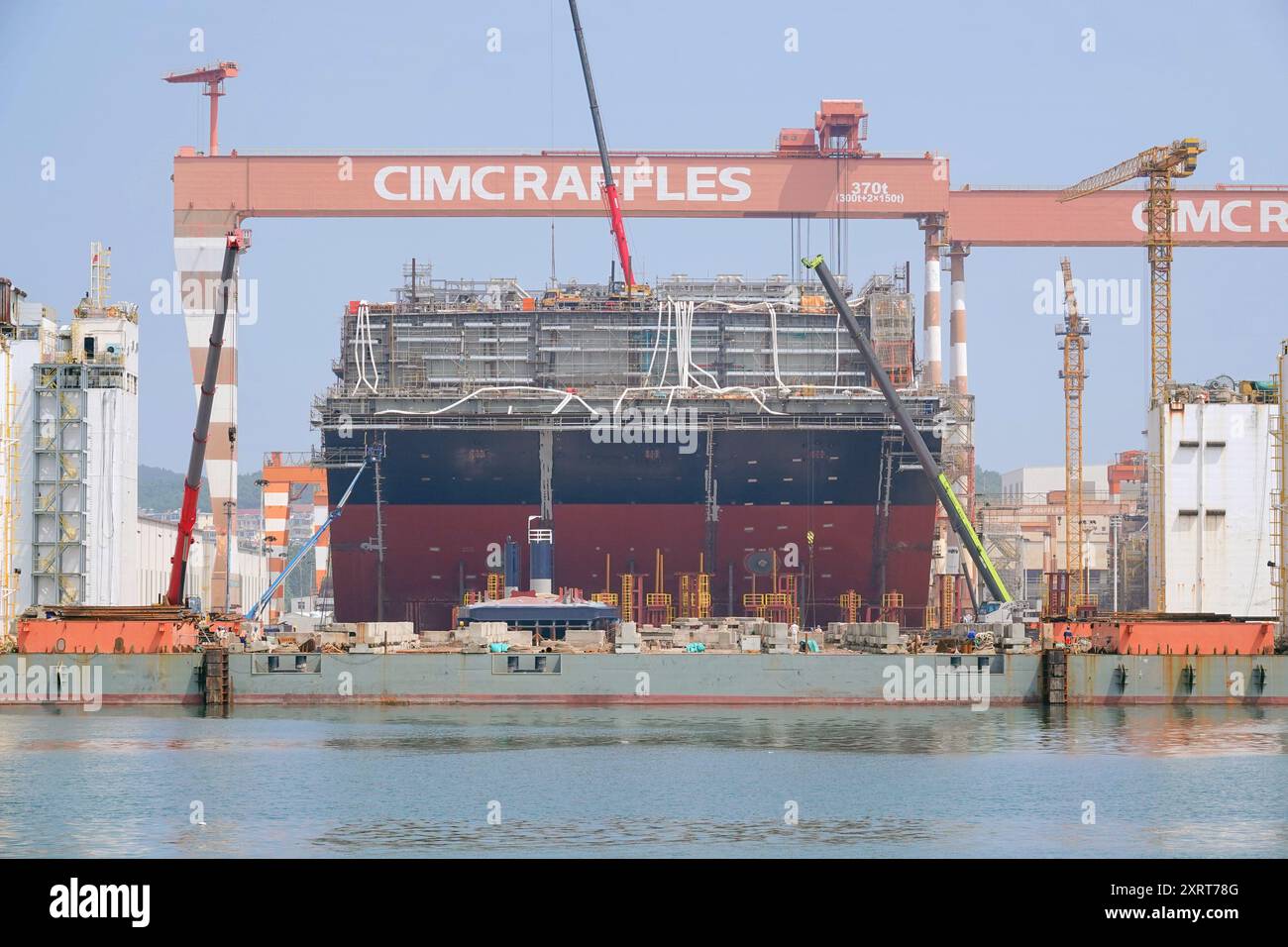 YANTAI, CHINA - AUGUST 7, 2024 - A large ship is under construction at CIMC Raffles ...