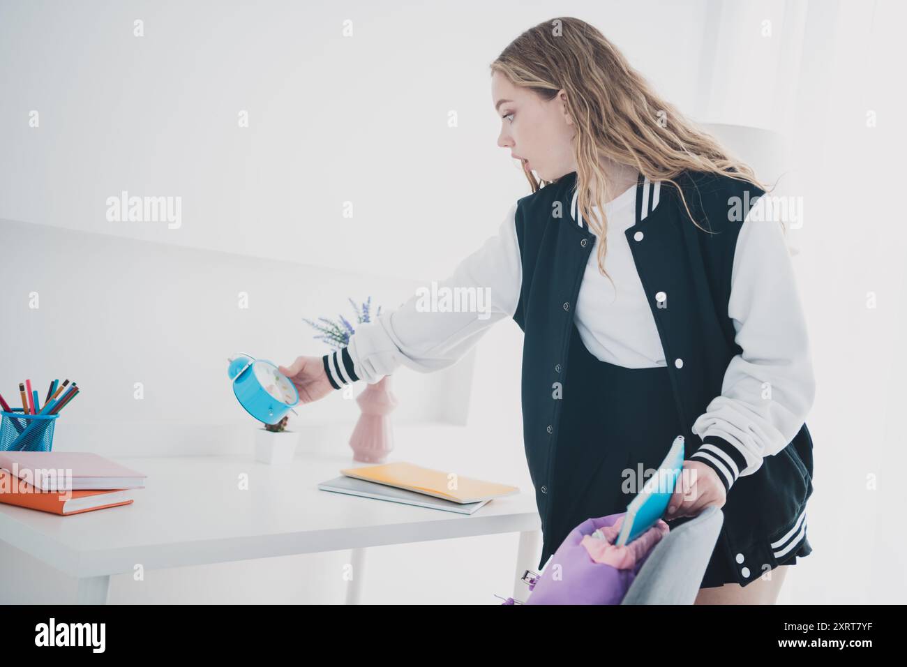 Photo of sweet pretty teen girl look alarm clock late nervous wear ...