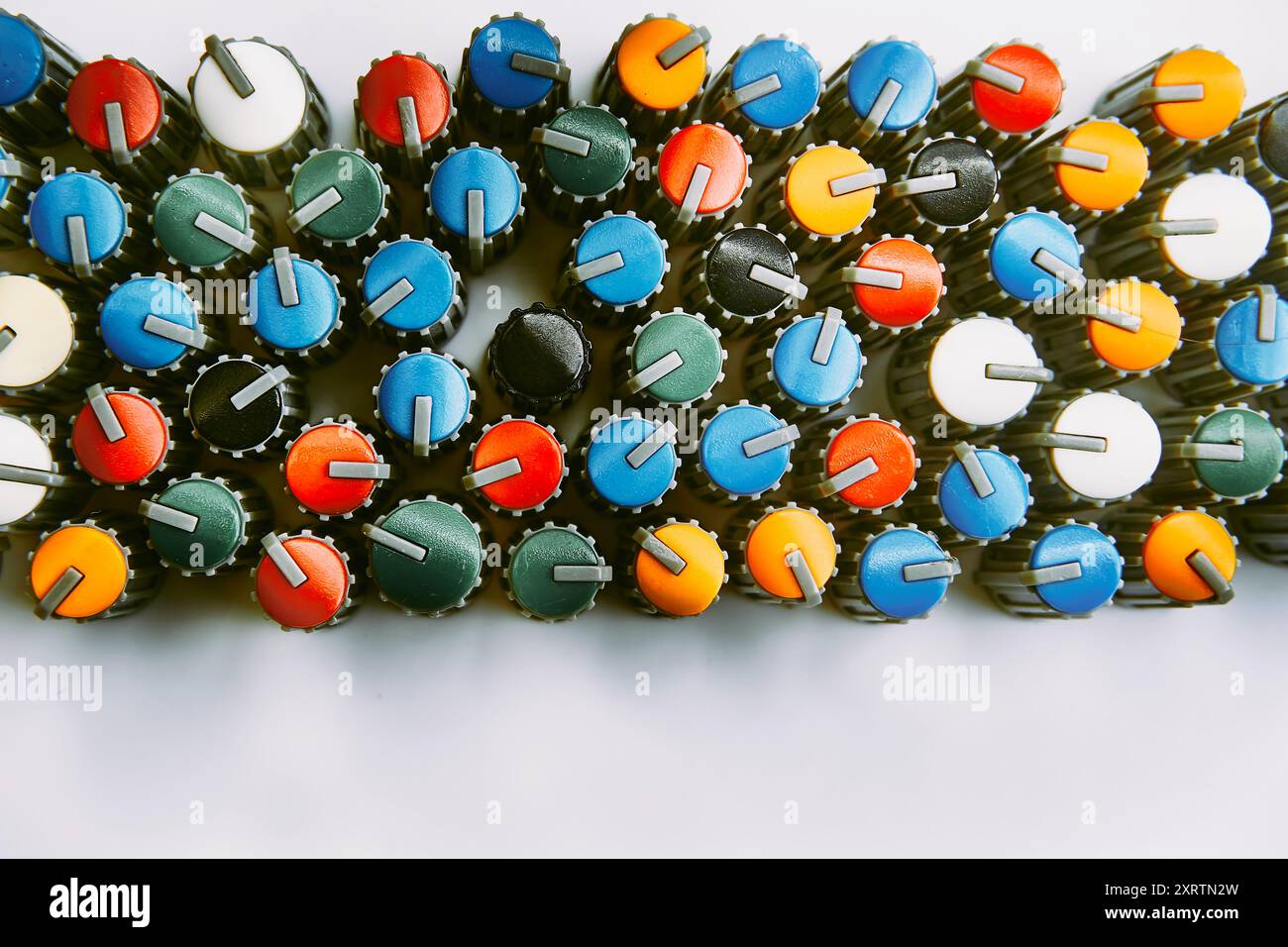 a rounded lump or ball, especially at the end or on the surface of ...