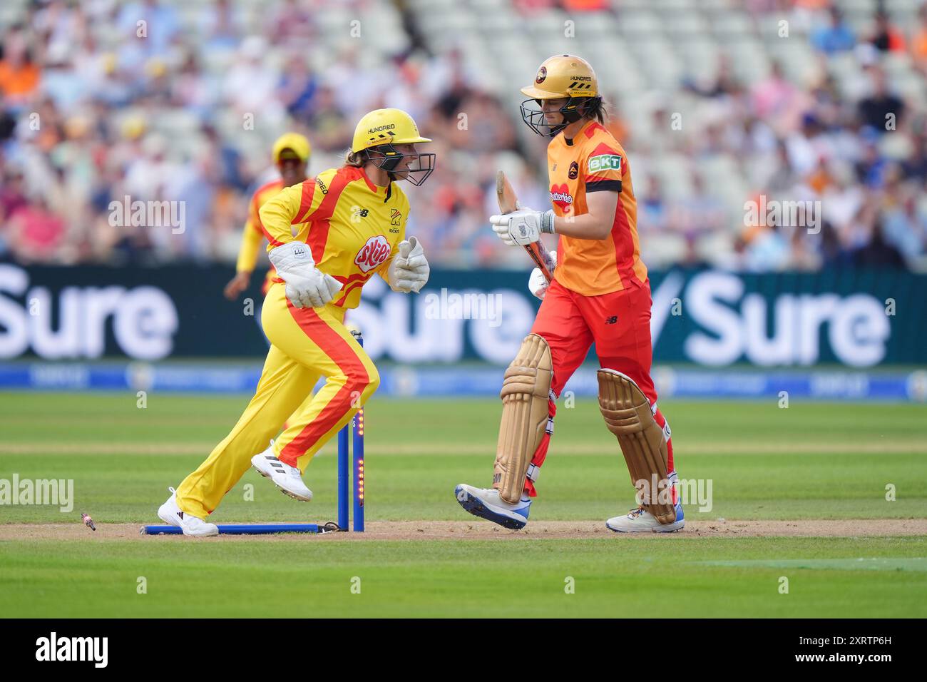 Birmingham Phoenix's Amy Jones (right) hits the stumps and is bowled ...
