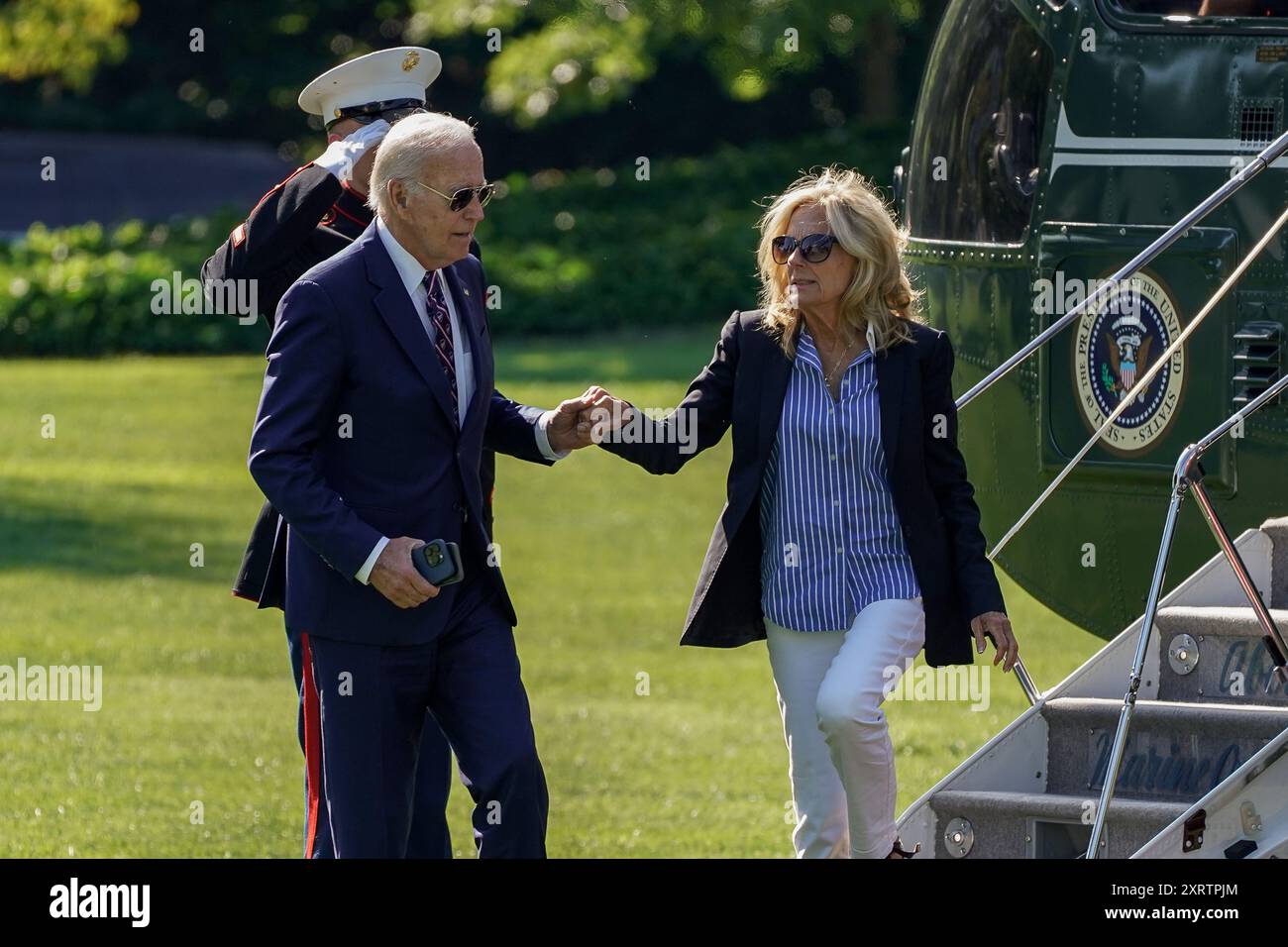 U.S. President Joe Biden and first lady Jill Biden exit Marine One ...