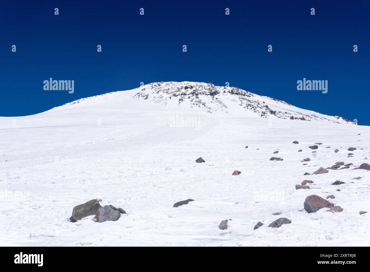 snowy mountain landscape with dark highland sky, view of the eastern ...