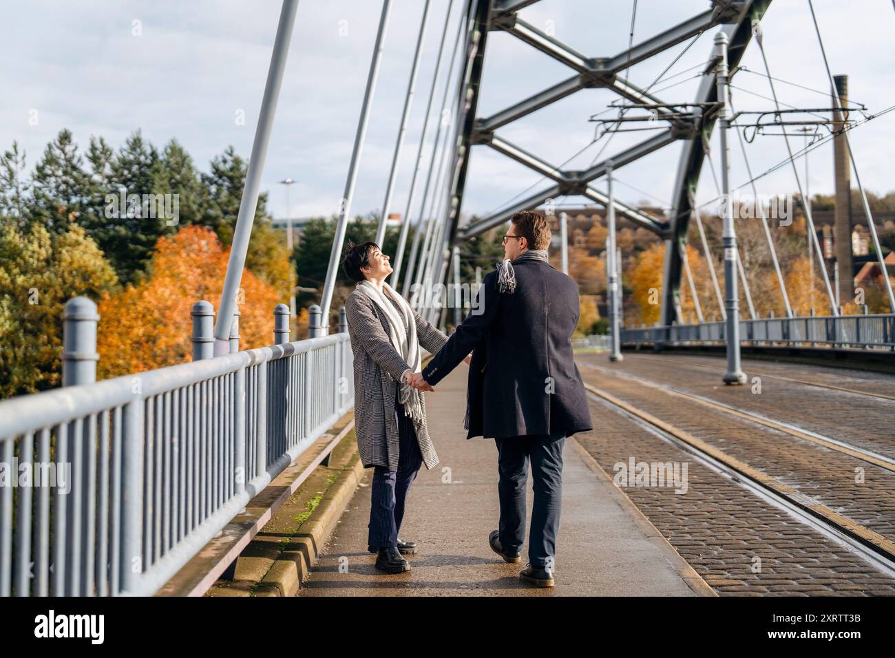Handsome man and beautiful woman couple falling in love, hugging each ...
