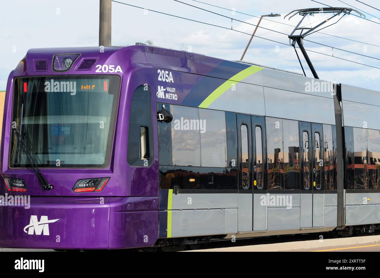 A Valley Metro Rail vehicle travels along Main Street in Mesa, Arizona ...