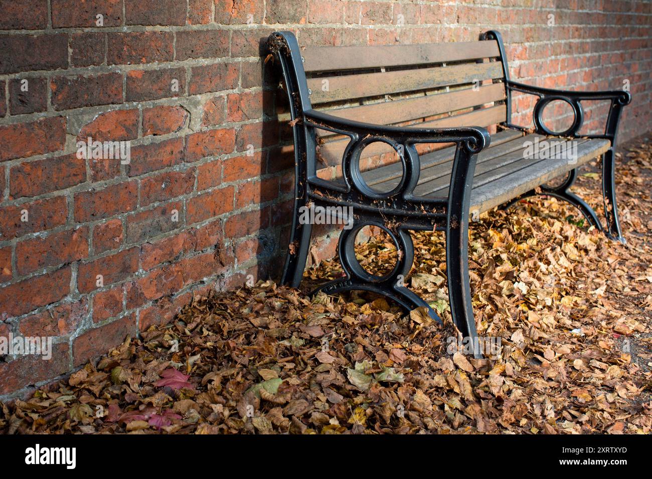 Wooden covered public bench hi-res stock photography and images - Alamy