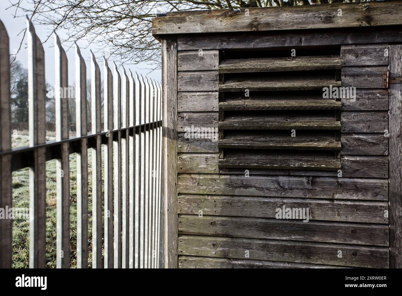 Large metal spikes on a perimeter security fence Stock Photo - Alamy