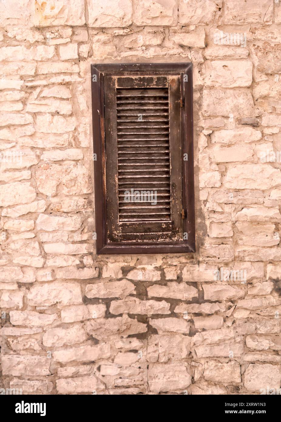 Old ancient wooden window with shutters on facade of old Italian house ...