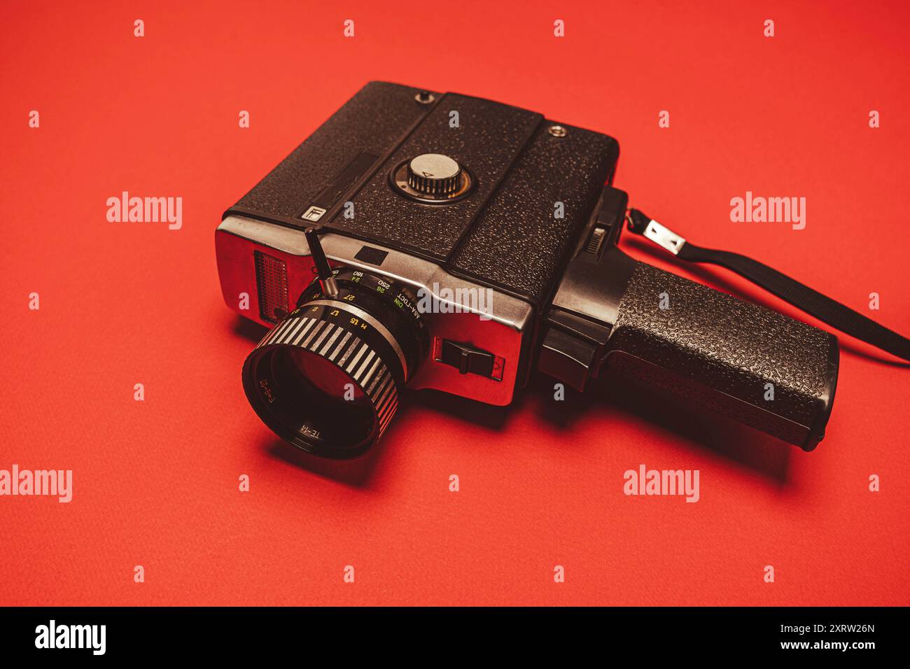 vintage portable movie camera on a red background. retro, 70s, 80s ...