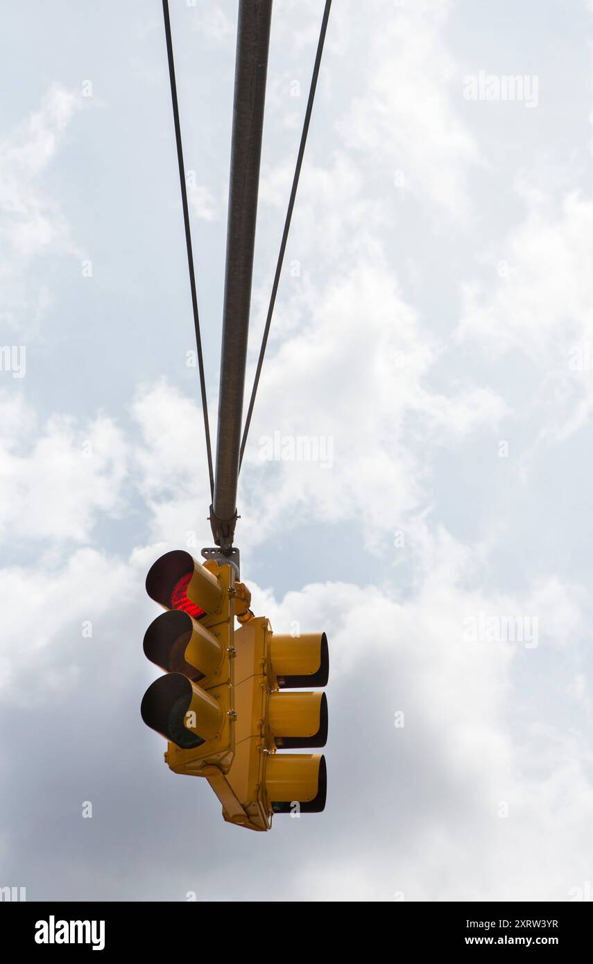 New York city street scene with traffic lights hanging overhead from ...