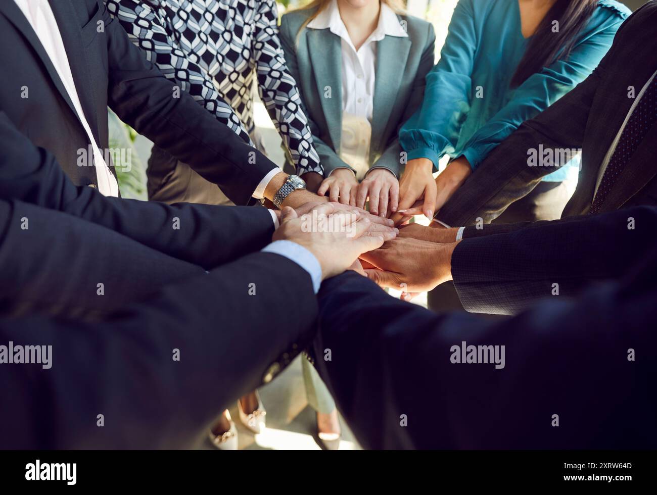 Top view photo of business people group putting their arms together in pile in a circle Stock ...