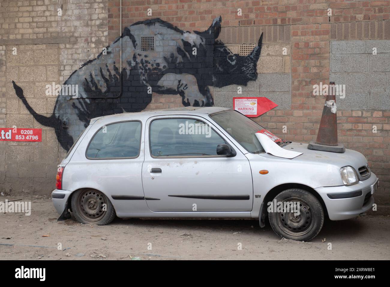 London, UK. 12 Aug 2024. People pose for photos with Street Artist ...