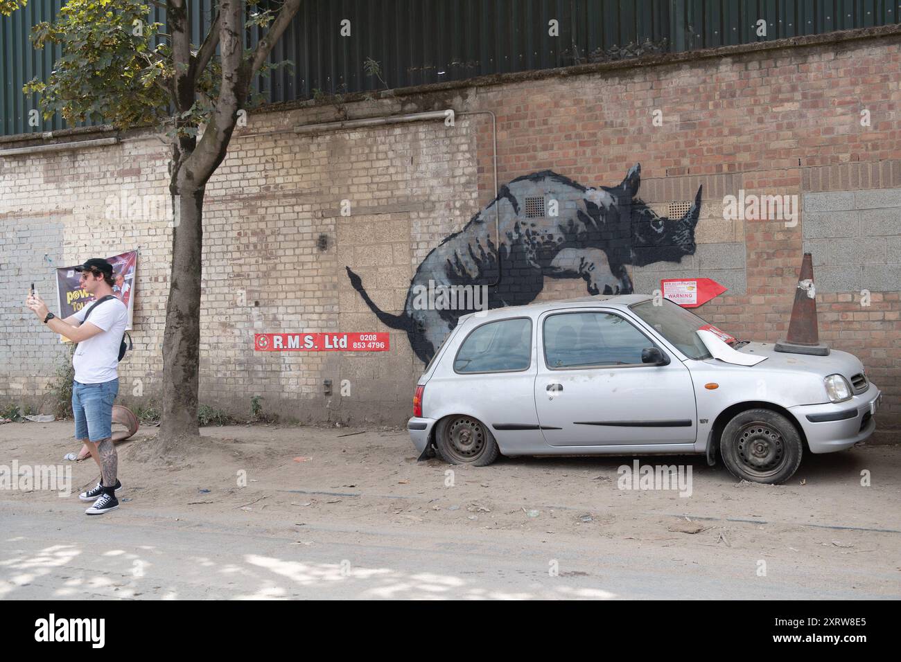 Banksy rhino car hi-res stock photography and images - Alamy