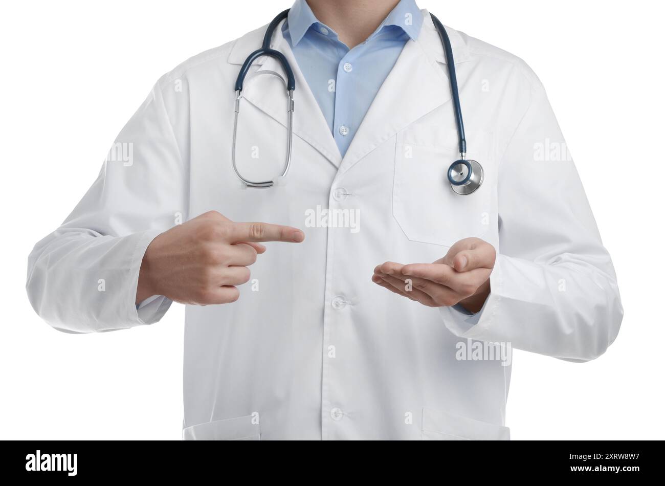 Doctor pointing at something on white background, closeup Stock Photo ...