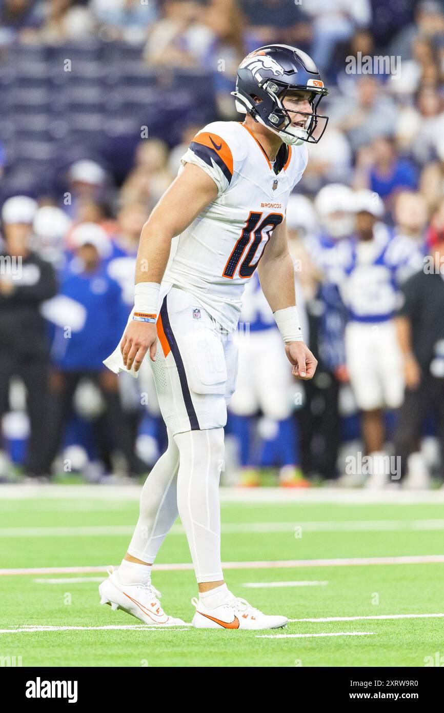 August 11, 2024: Denver Broncos quarterback Bo Nix (10) directs the ...