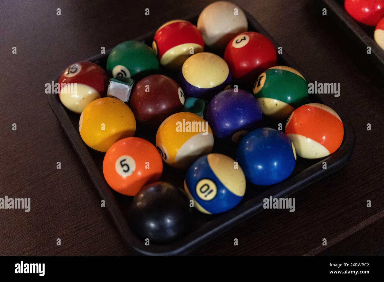 Billiard balls are organized in a rack ready for the game Stock Photo ...