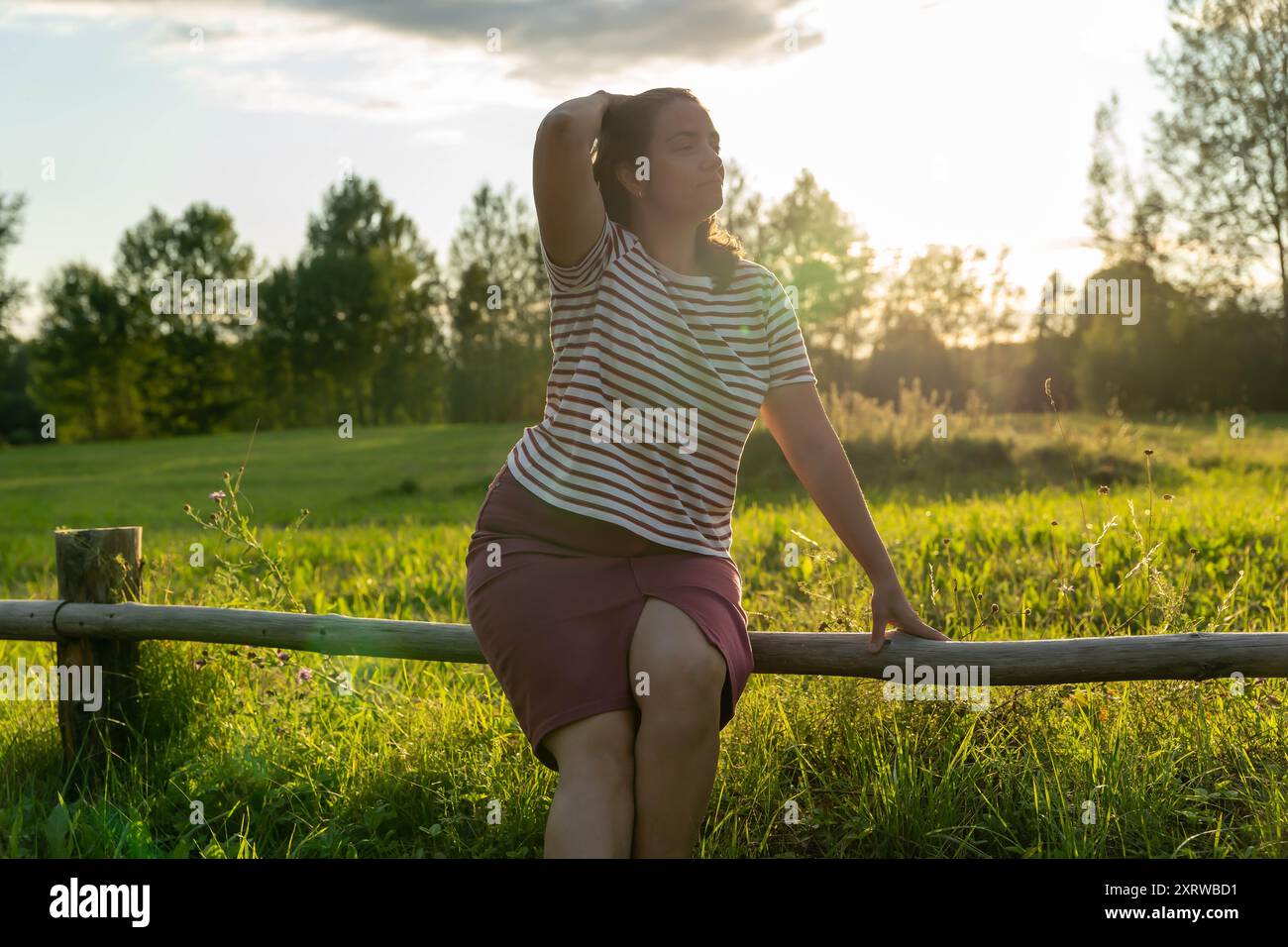 Woman relaxes in warm hi-res stock photography and images - Alamy