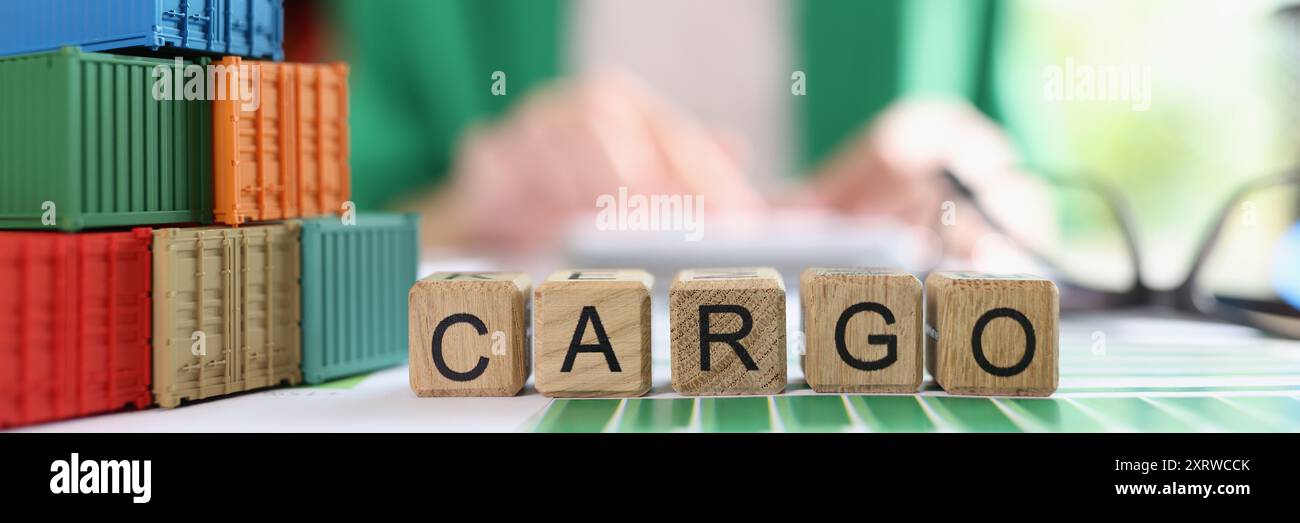 Cargo word collected with wooden cubes and shipping containers Stock ...