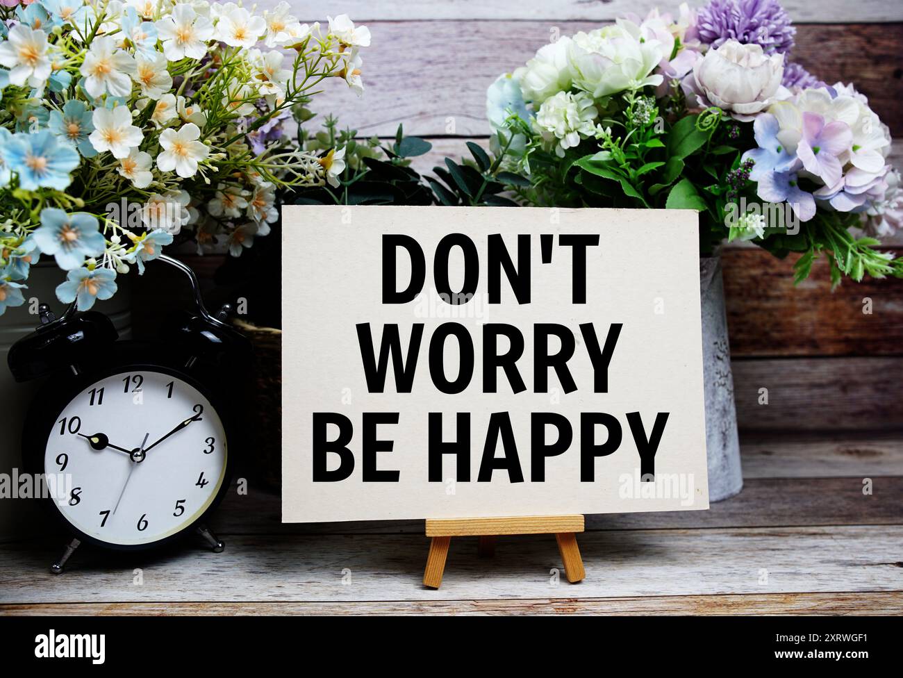 Don't worry be happy text motivational and inspiration quote with alarm ...
