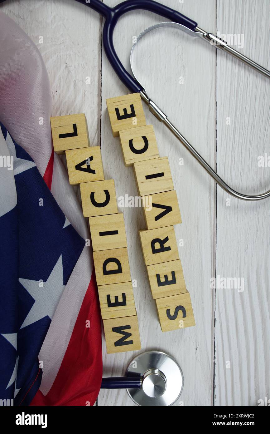 Medical Service alphabet letters with USA flag on wooden background ...