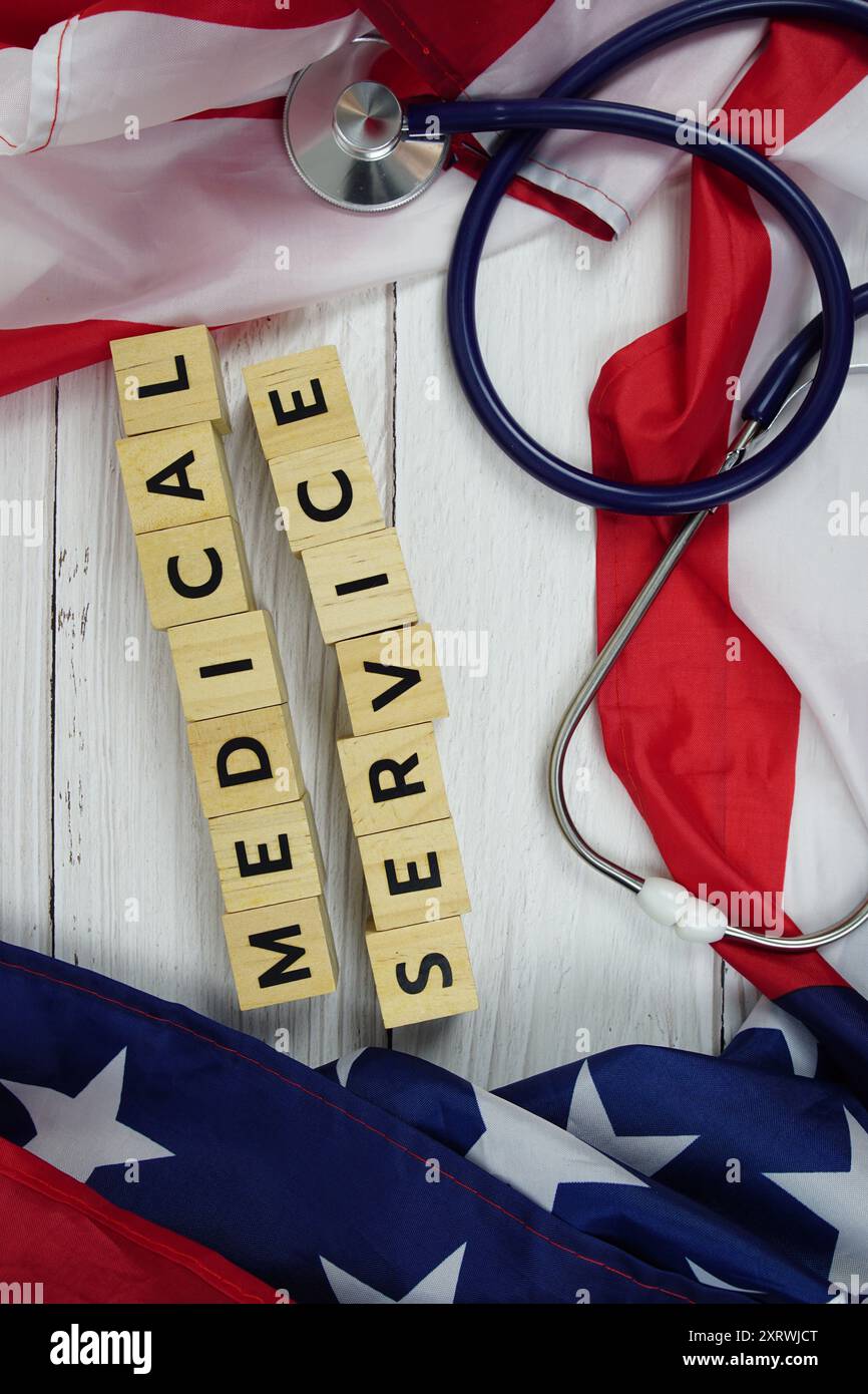 Medical Service alphabet letters with USA flag on wooden background ...