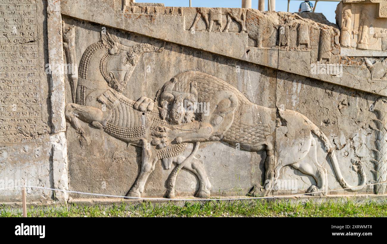 Persepolis, Iran - 3 May 2019: Carvings on a wall at ruins of ...