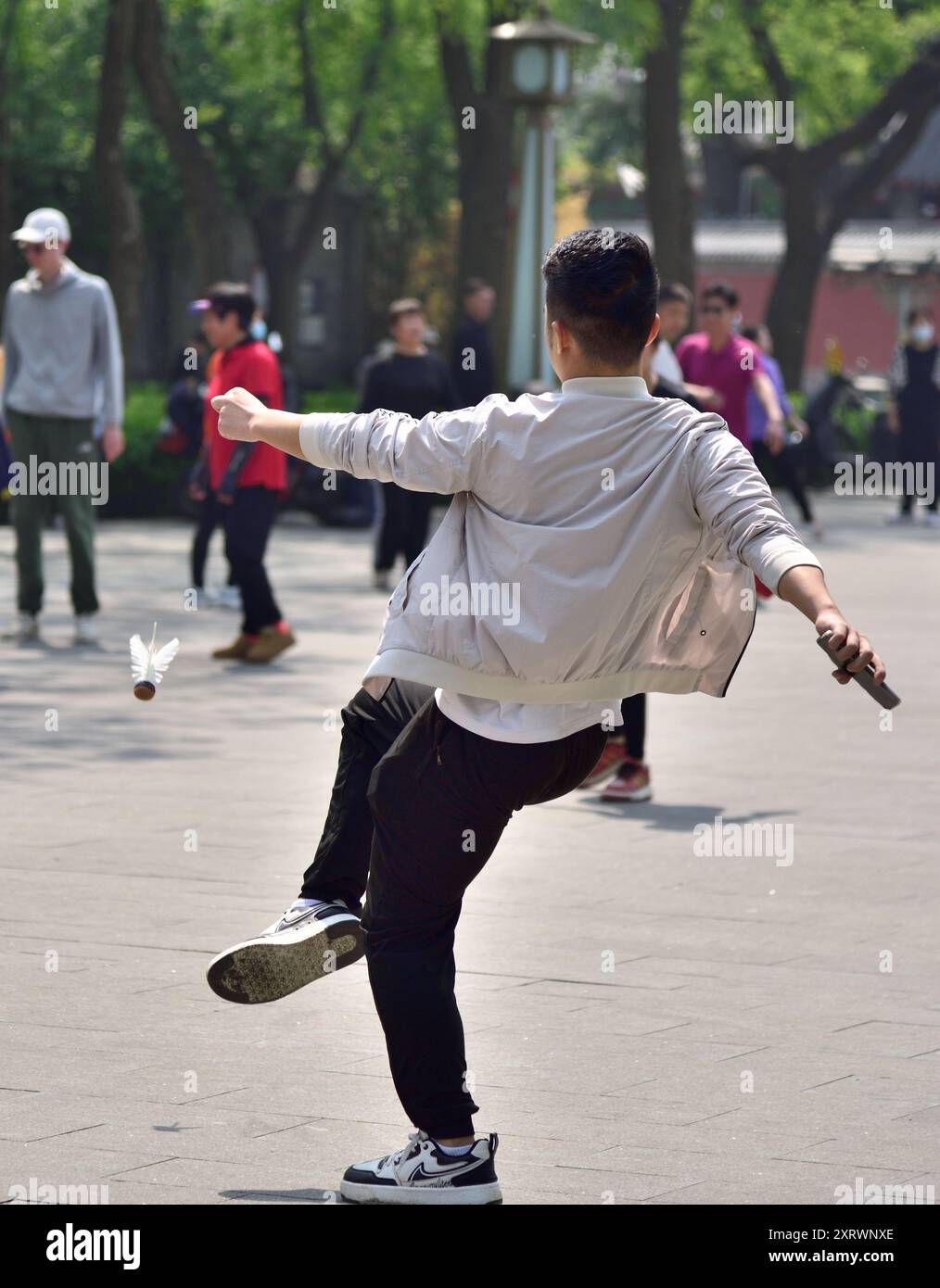 People playing Jianzi, traditional Chinese national sport in which ...