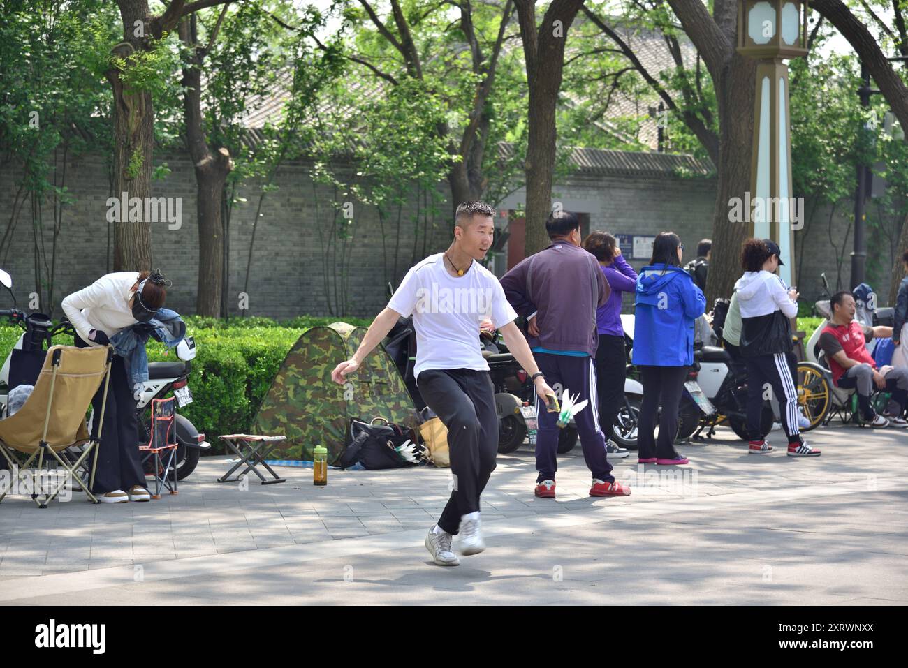 People playing Jianzi, traditional Chinese national sport in which ...