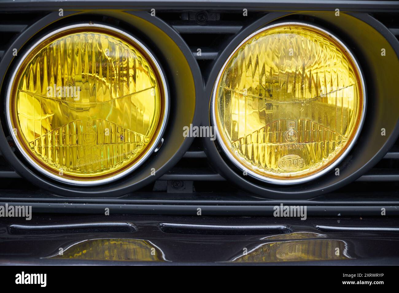 Close-up view of yellow headlights on vintage BMW 6 series Stock Photo ...