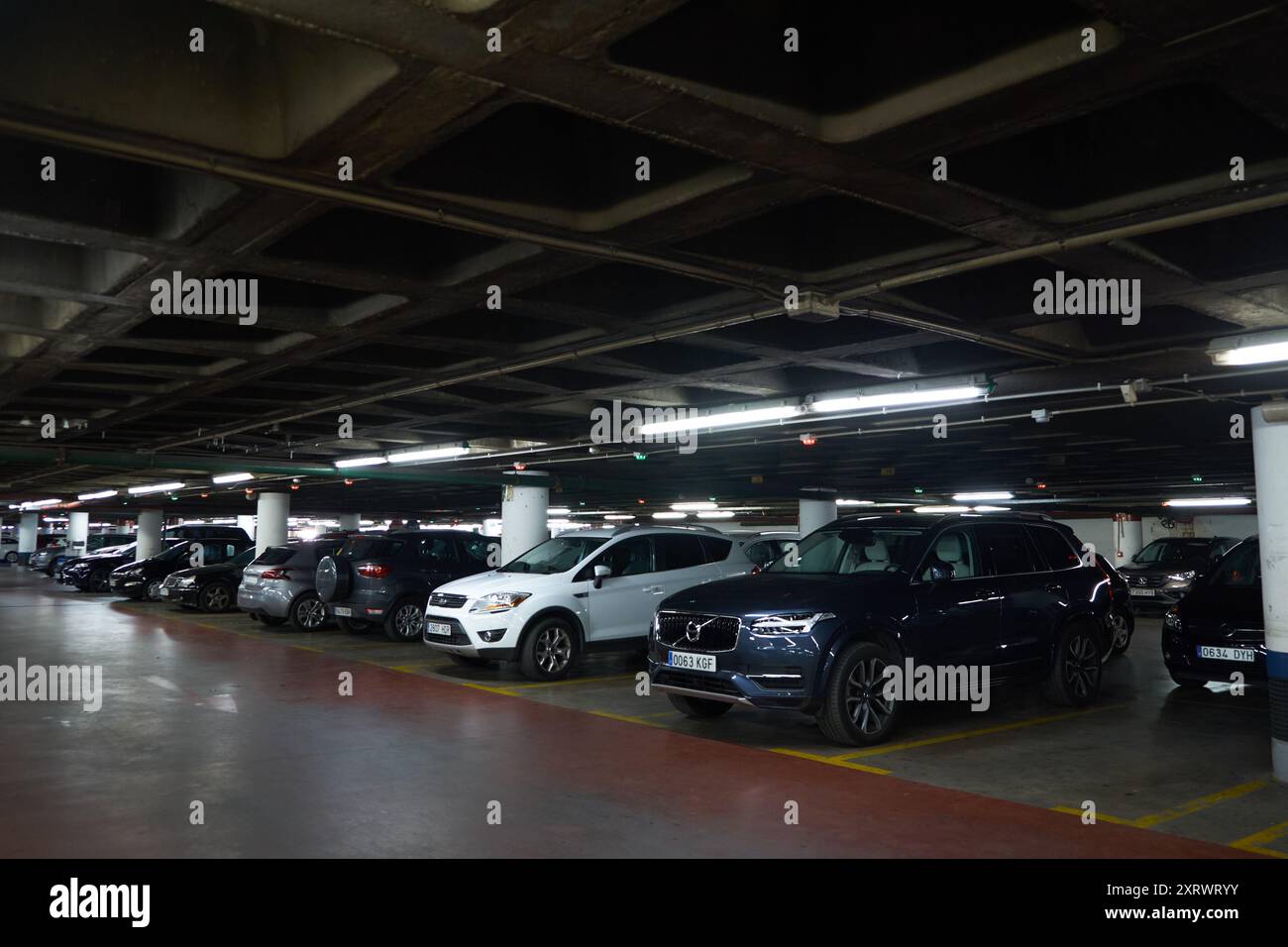Cars parked in the underground parking at Plaza de La Marina. Málaga ...