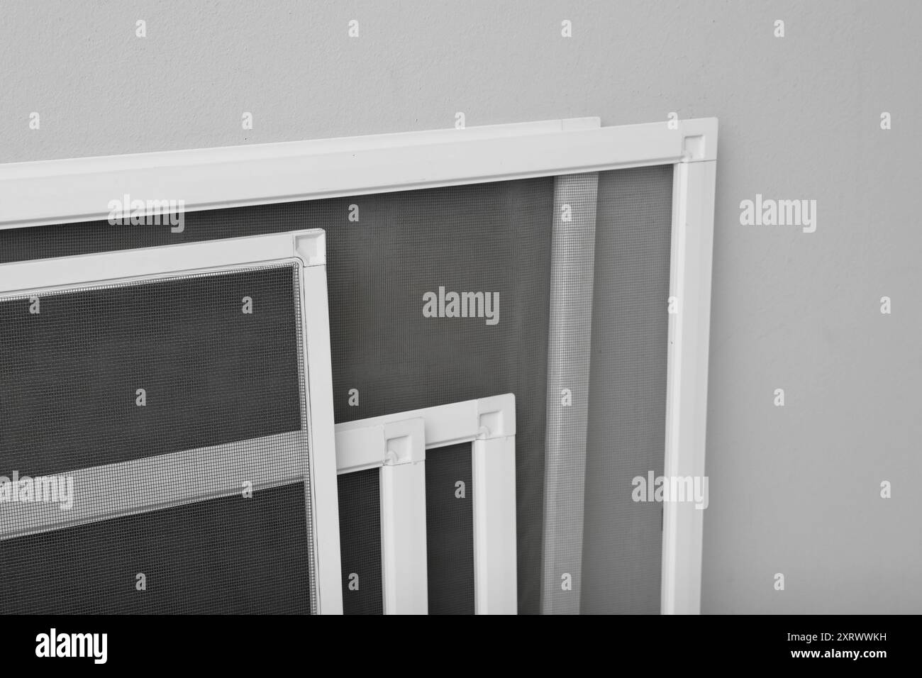 Set of window screens on light grey background, closeup Stock Photo - Alamy