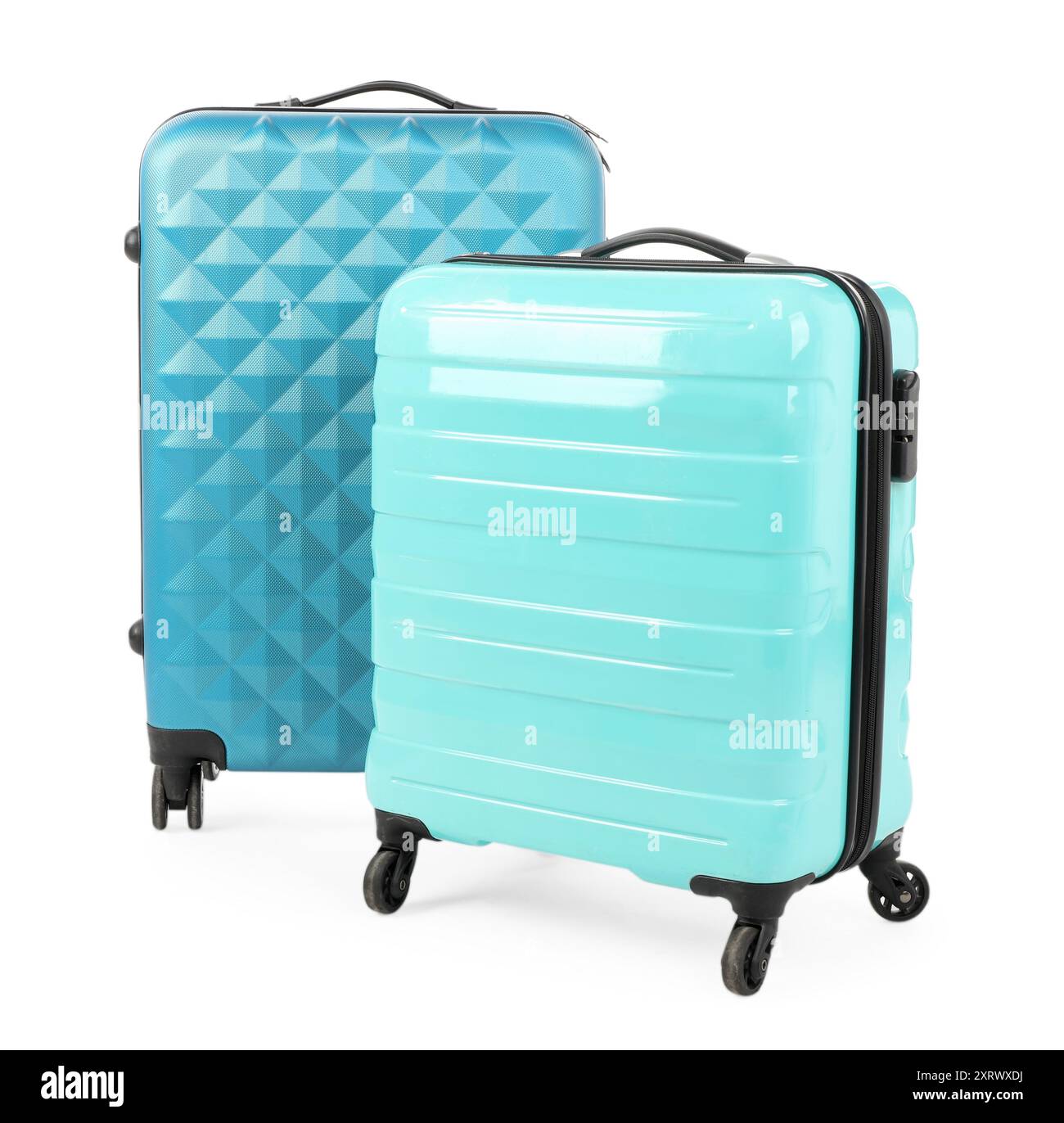 Two new light blue suitcases isolated on white Stock Photo - Alamy